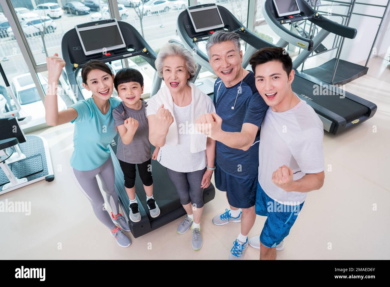 A family of five in the gym Stock Photo - Alamy