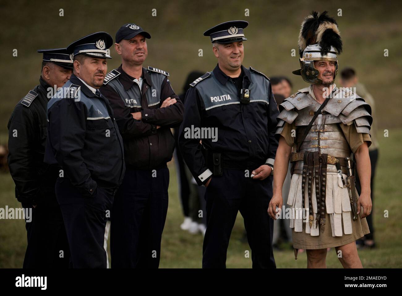 Police officers watch reenactments of Roman Empire era gladiator fights ...