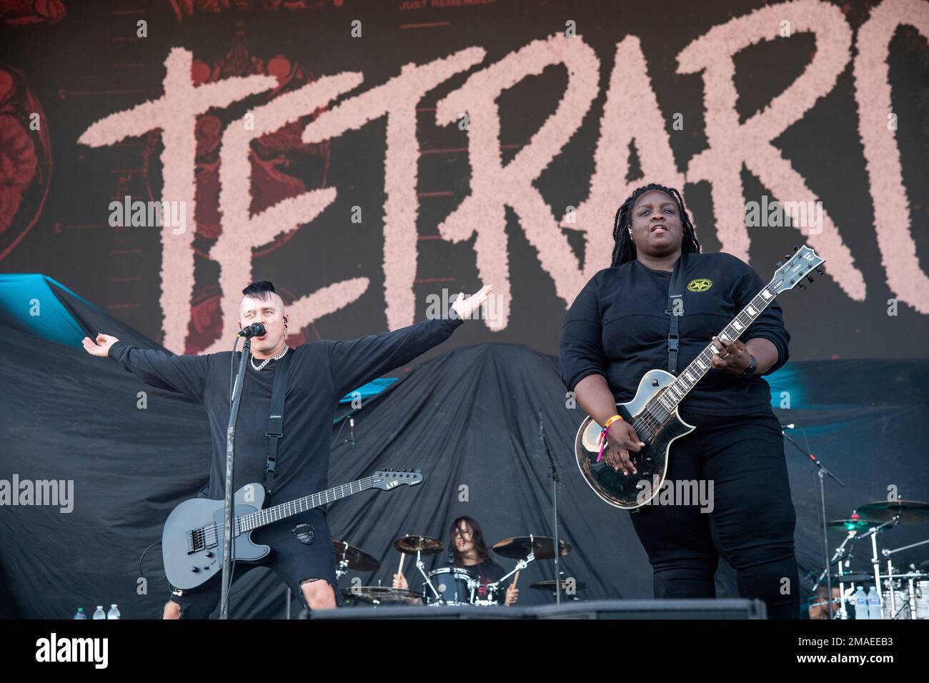 Josh Fore, left, and Diamond Rowe of Tetrarch performs at the Louder ...