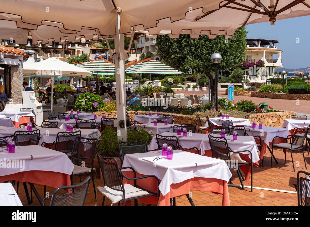 Restaurant Lunch Tables in the Shade of a Wooden Canopy with Colourful ...