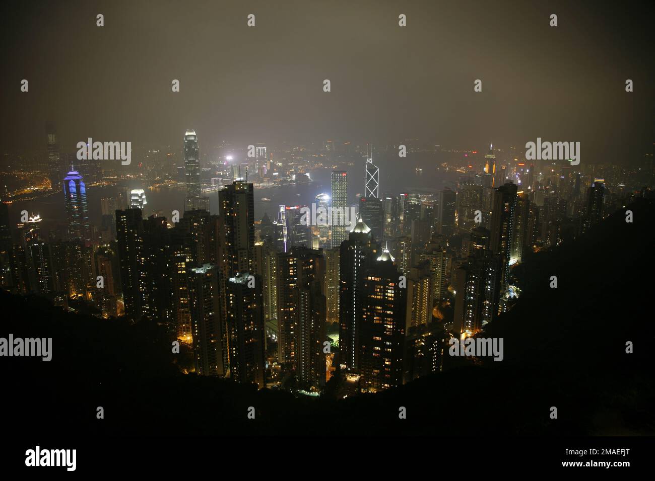 Hong Kong city skyline from Victoria peak at night Stock Photo - Alamy