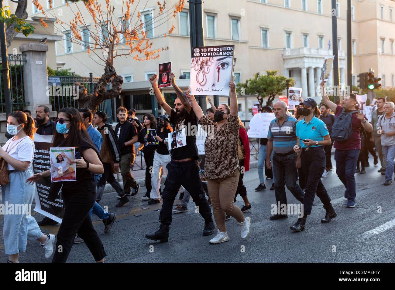 Protesters shout slogans during a protest against the death of Iranian ...