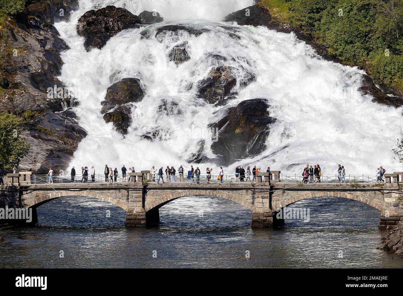 The incredible site of the waterfall at the port of Hellesylt in Norway ...