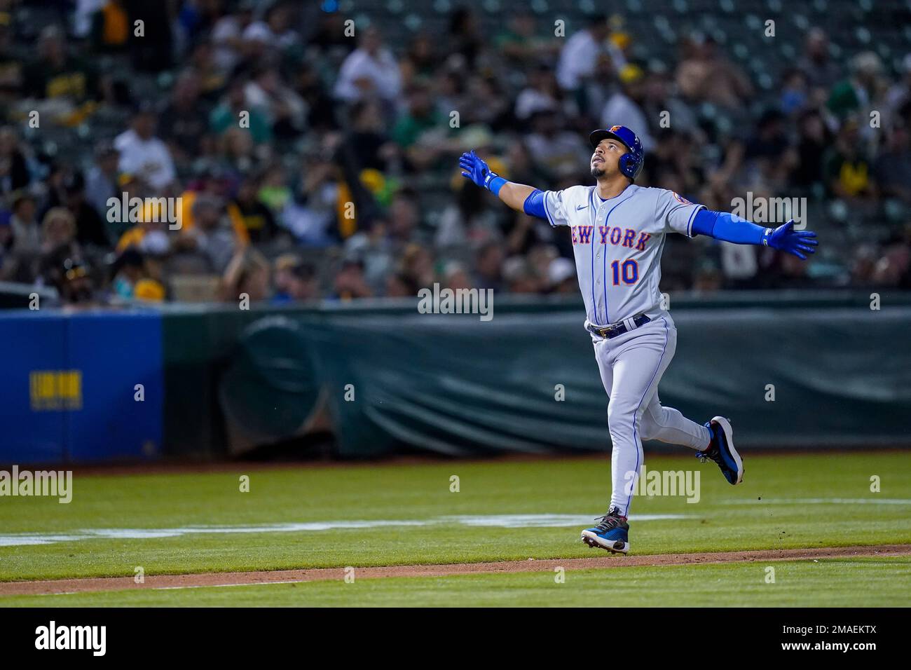 New York Mets' Eduardo Escobar runs the bases after hitting a grand ...