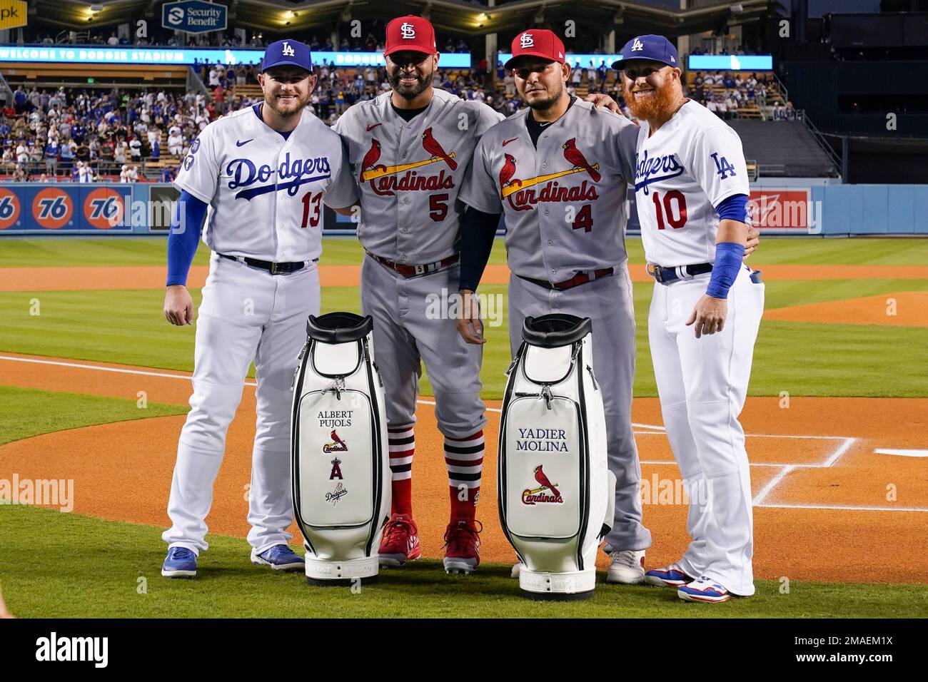 Los Angeles Dodgers third baseman Max Muncy (13) and designated hitter ...