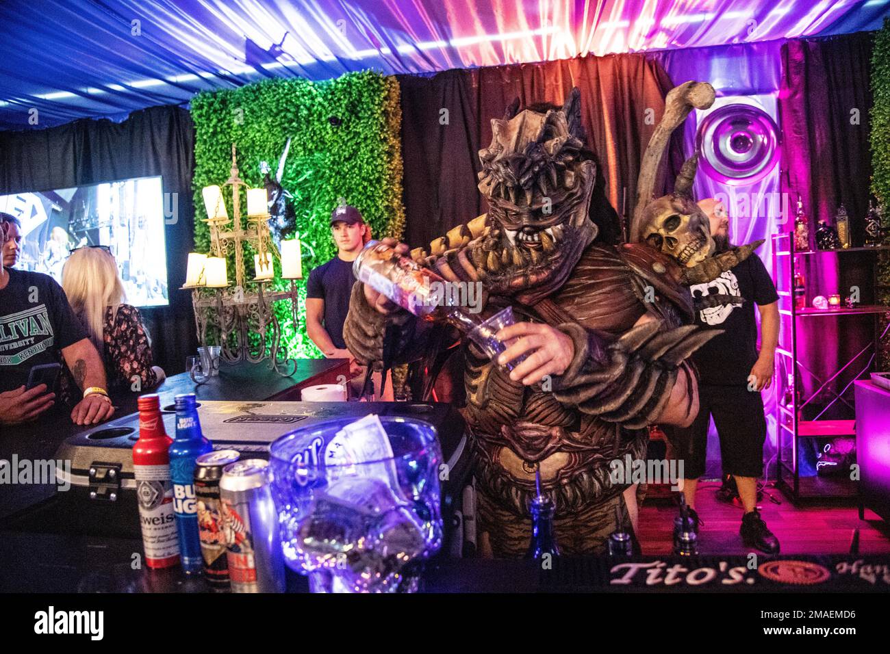 A member of GWAR is seen bartending at the Louder Than Life Music ...