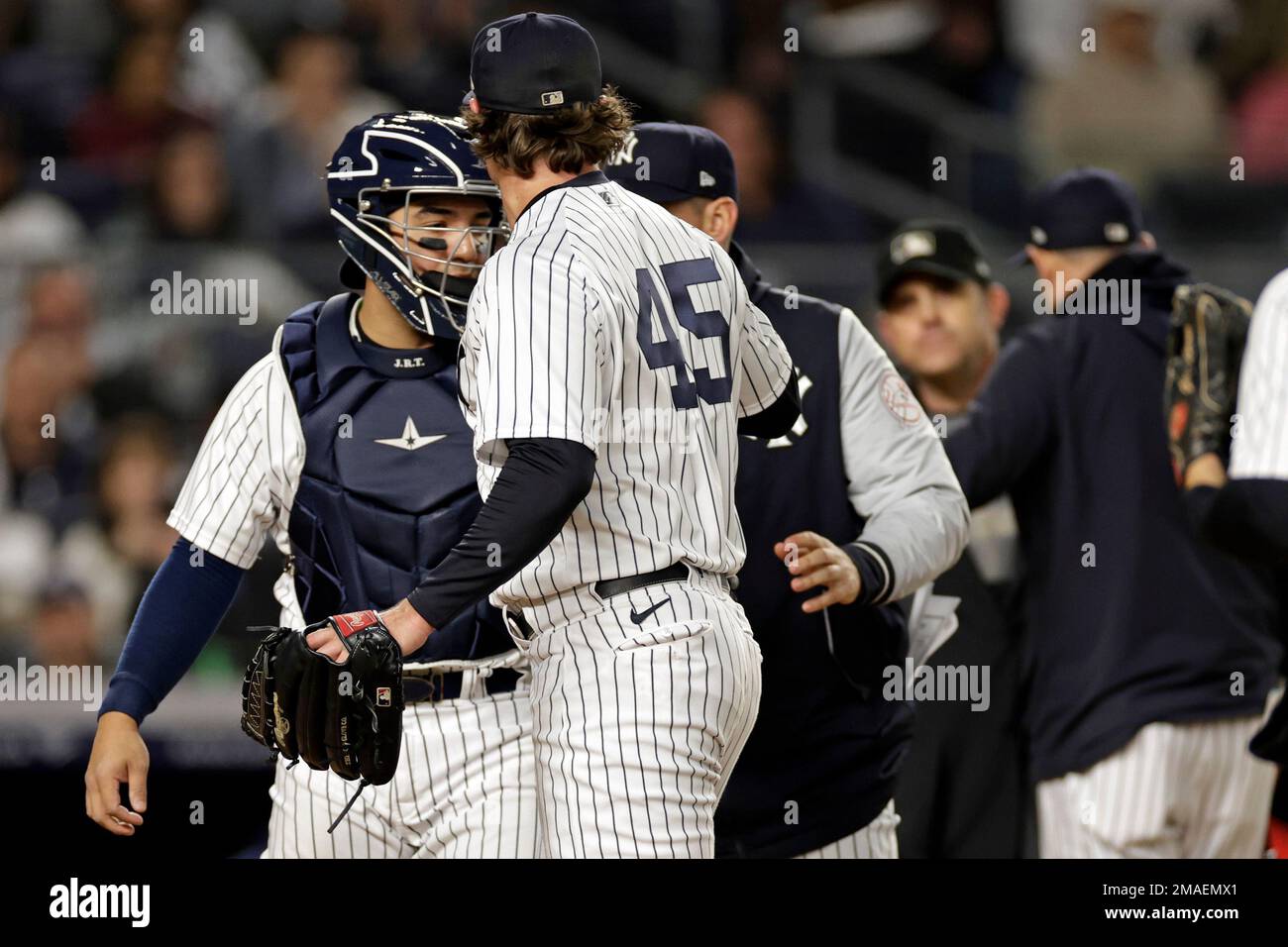 New York Yankees pitcher Gerrit Cole (45) is separated from home plate ...