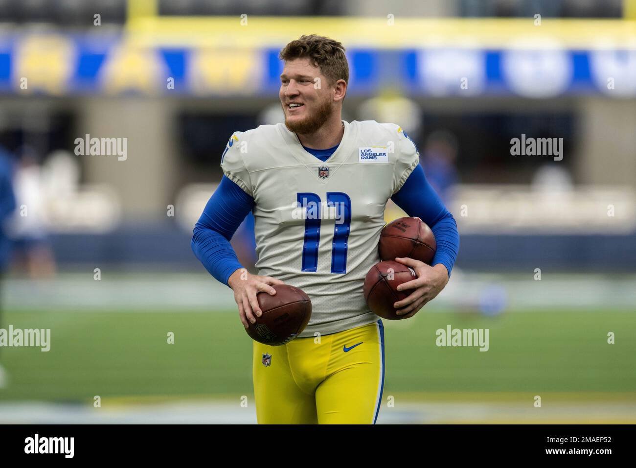 Los Angeles Rams punter Riley Dixon (11) jogs before an NFL football ...