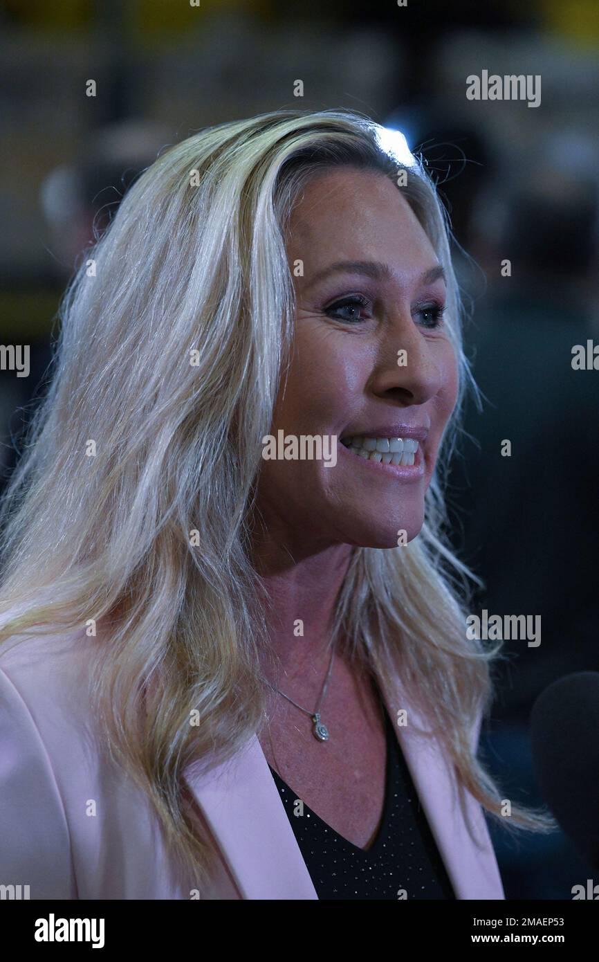 Rep. Marjorie Taylor Greene, R-Ga., talks to the media at DMI Companies ...