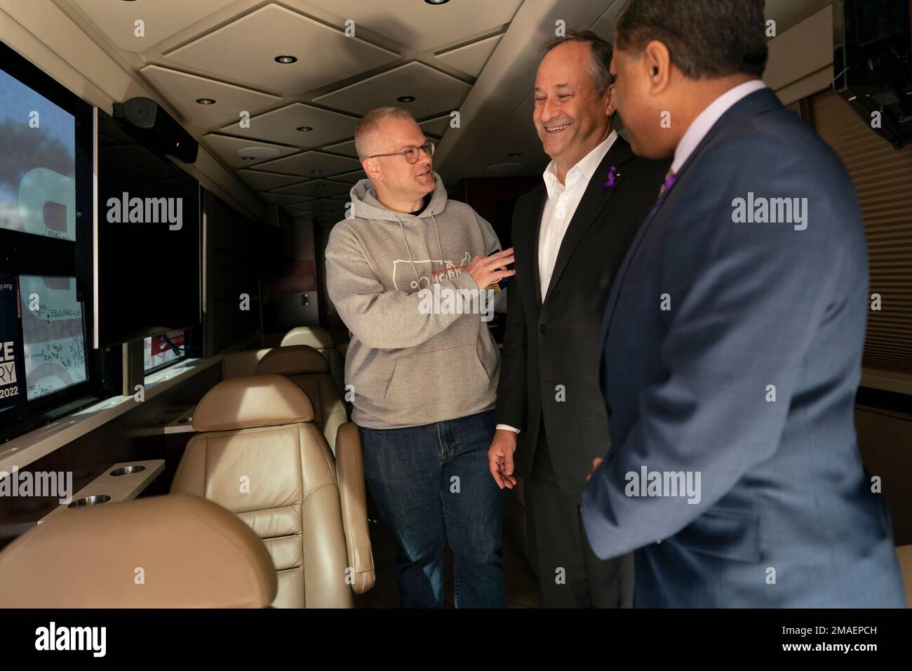 Douglas Emhoff, husband of Vice President Kamala Harris, center, and Dr ...