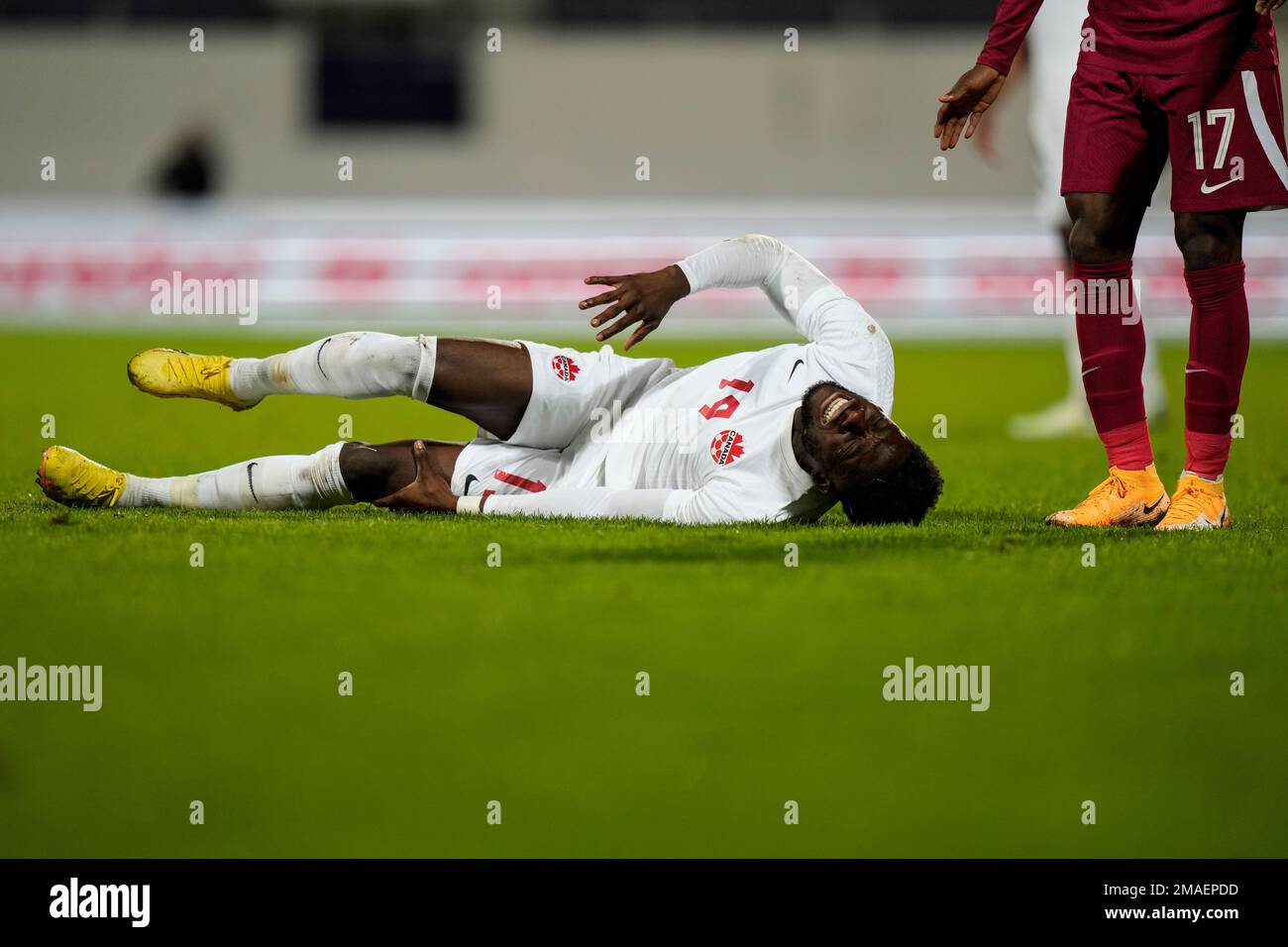 Canada's Alphonso Davies lying injured during the international ...