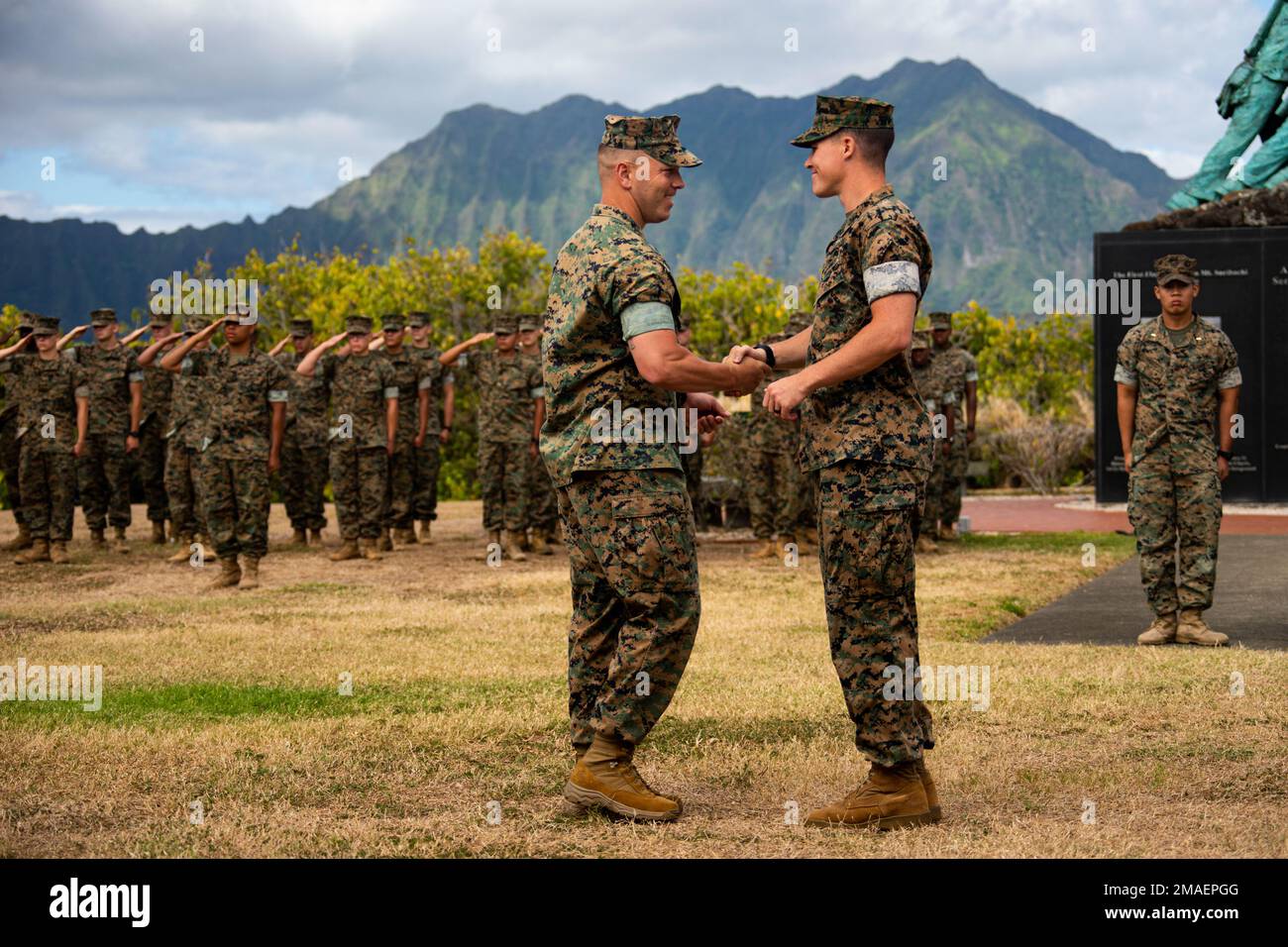 U.S. Marine Corps Capt. Nicholas Pugh, right, outgoing commanding ...