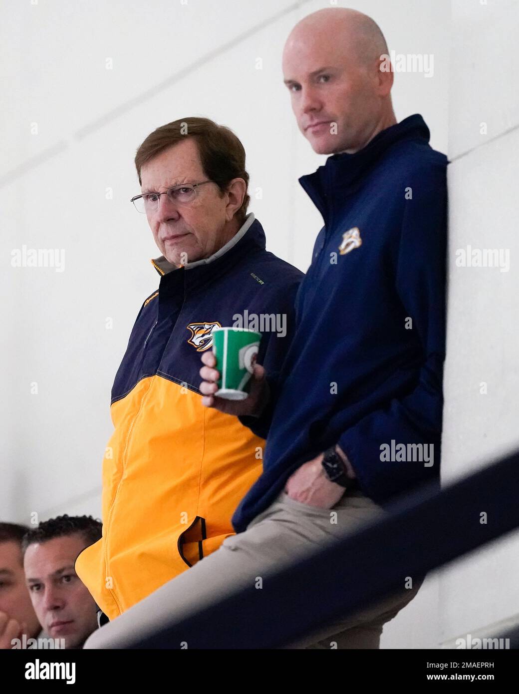 Nashville Predators general manager David Poile, left, and Jeff Kealty ...