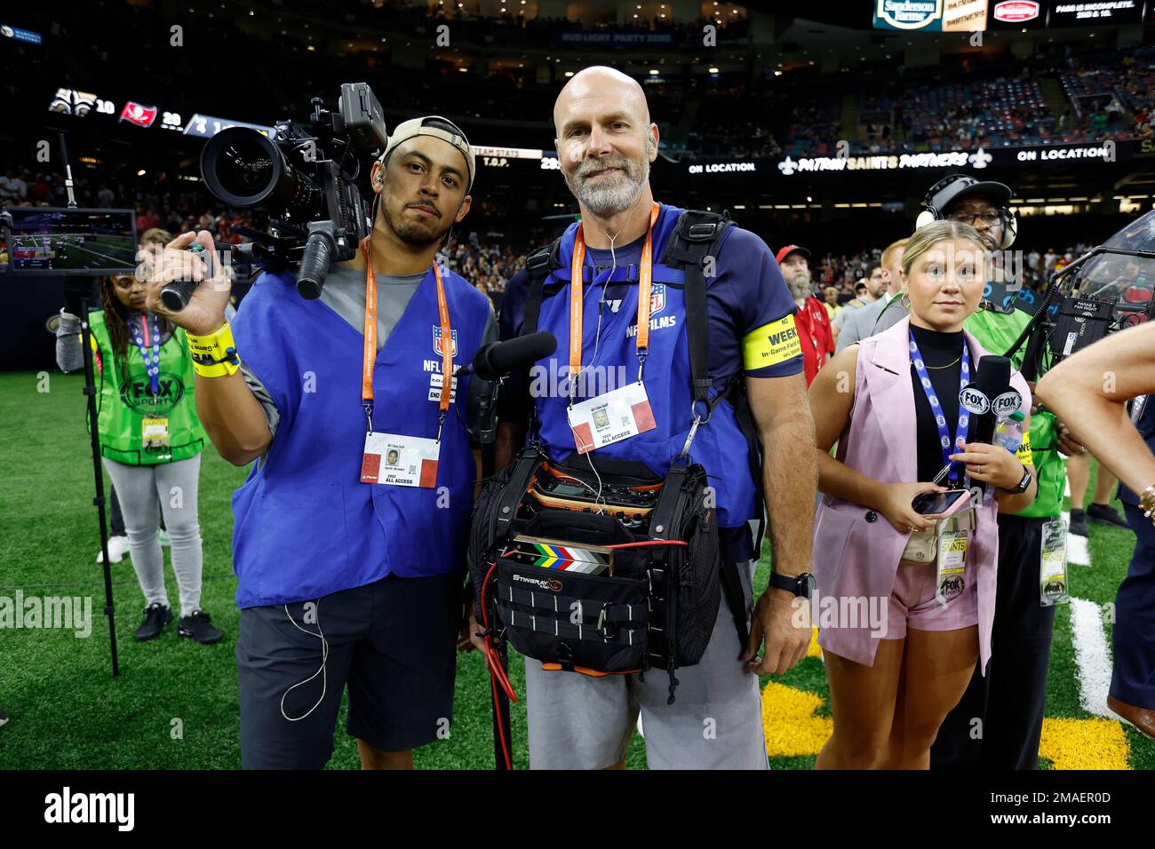 NFL Films cinematographer DJ McConduit and sound mixer Mark Ricci pose ...