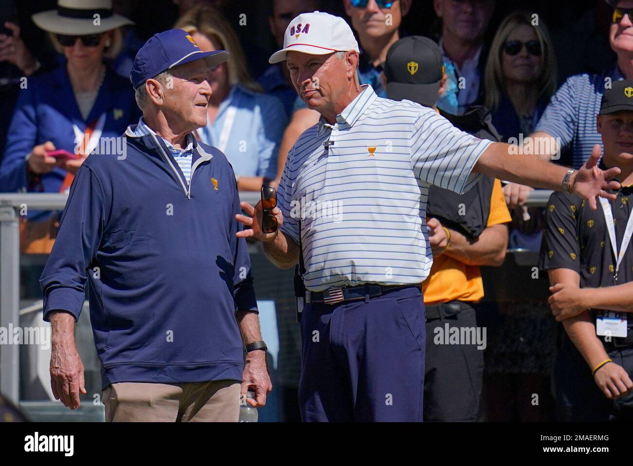 Former President George W. Bush speaks with USA team captain Davis Love ...