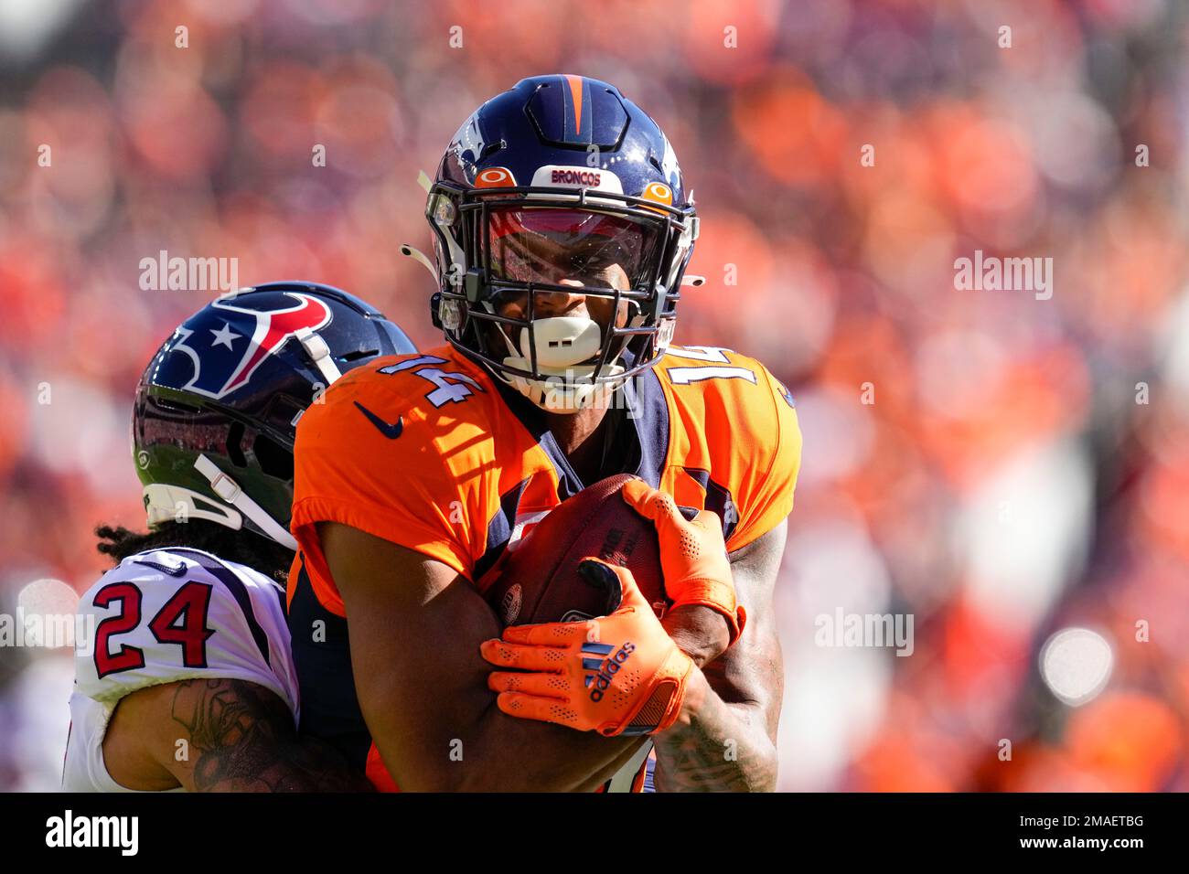 Denver Broncos wide receiver Courtland Sutton (14) catches a pass against Houston Texans ...