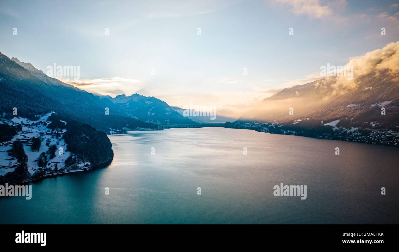 Lake in between mountains in the Alps, Switzerland Stock Photo - Alamy