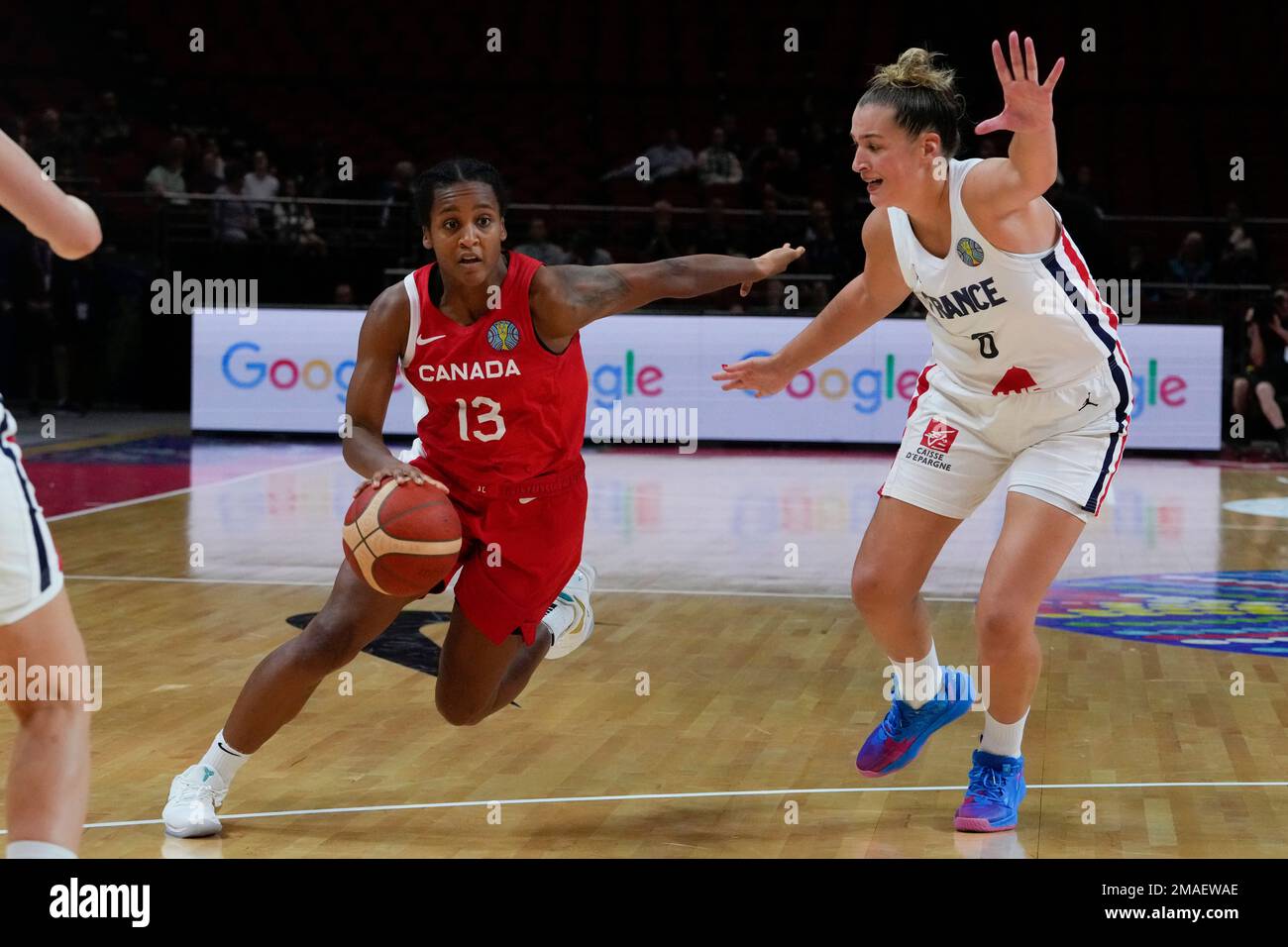 Canada's Shay Colley runs past France's Alexia Chartereau during their ...