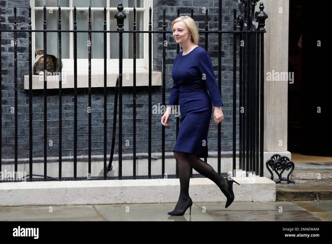 Britain's Prime Minister Liz Truss walks past Larry the Cat, Chief ...