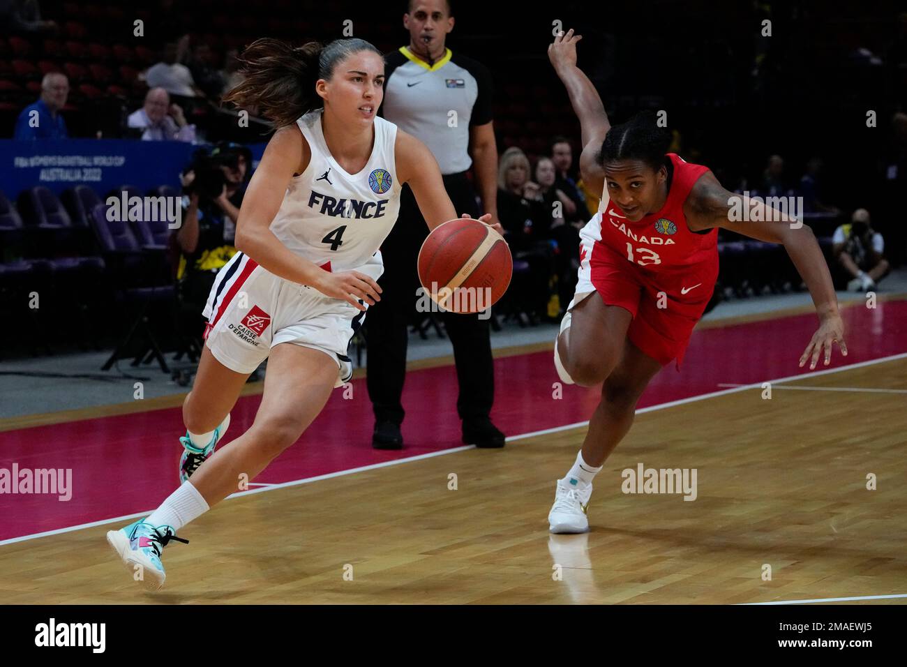 France's Marine Fauthoux, left, runs past Canada's Shay Colley during ...