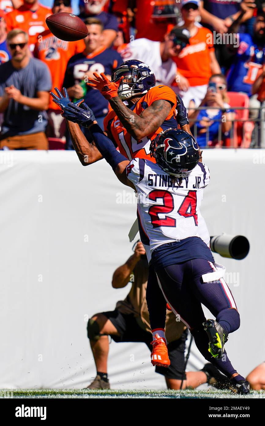 Denver Broncos wide receiver Courtland Sutton (14) is defended by Houston Texans cornerback ...