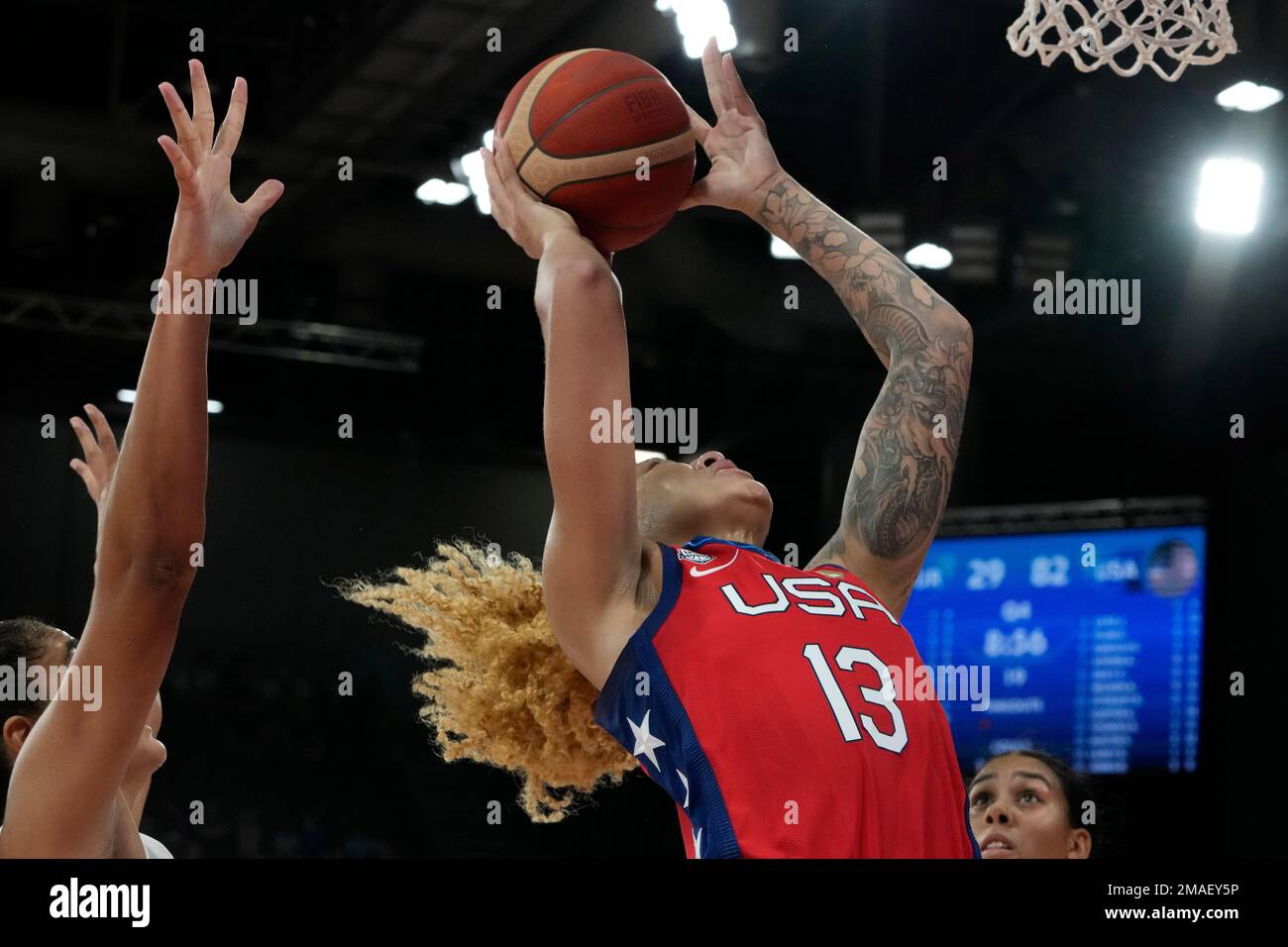 United States' Shakira Austin tries to shoot for goal against Puerto ...