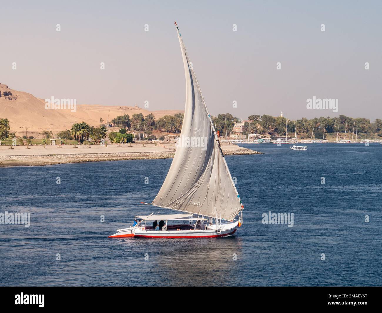 Felucca boat sailing on the Nile river in Aswan, Egypt Stock Photo - Alamy