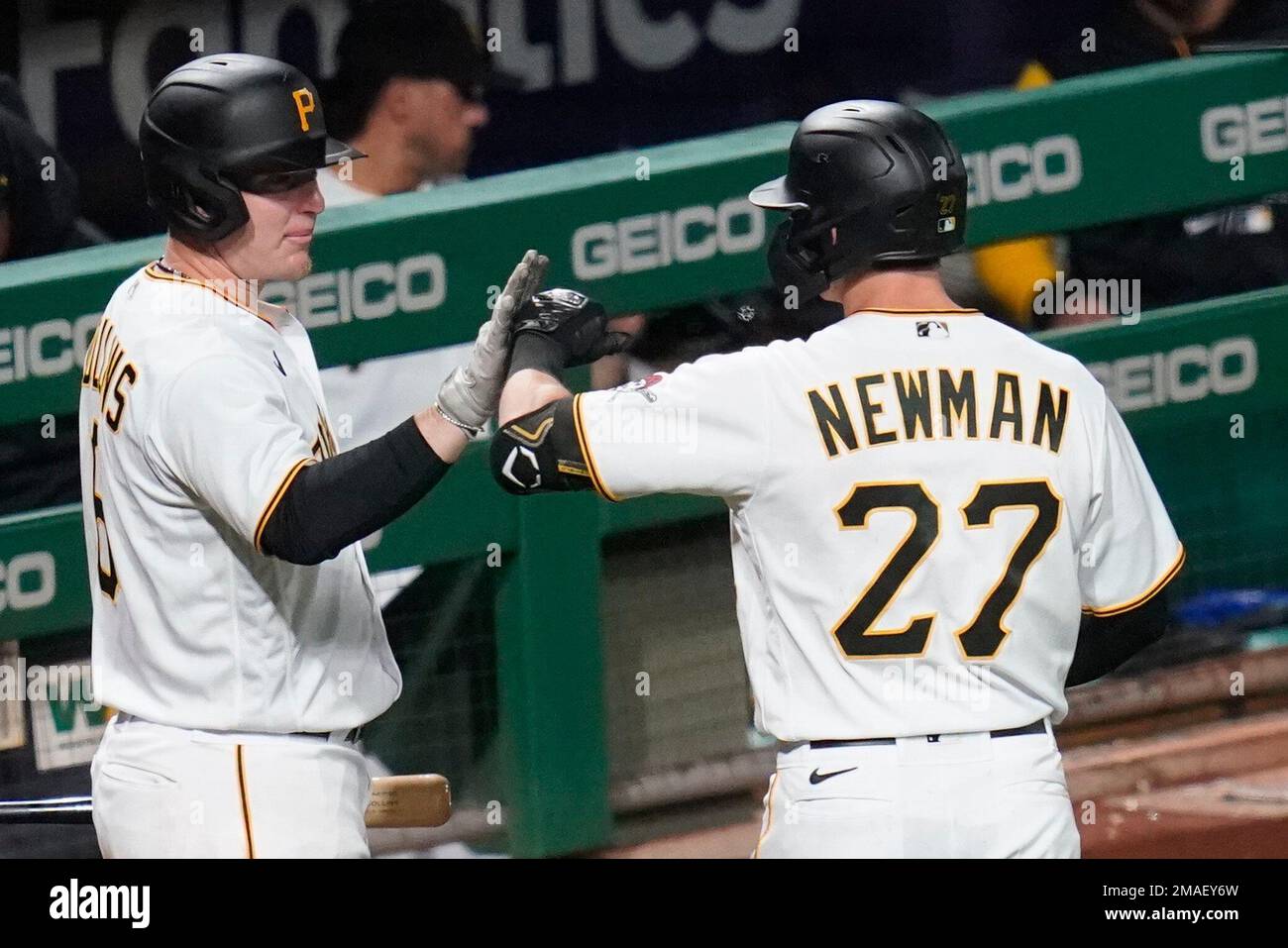 Pittsburgh Pirates' Kevin Newman (27) is greeted by Zack Collins after ...