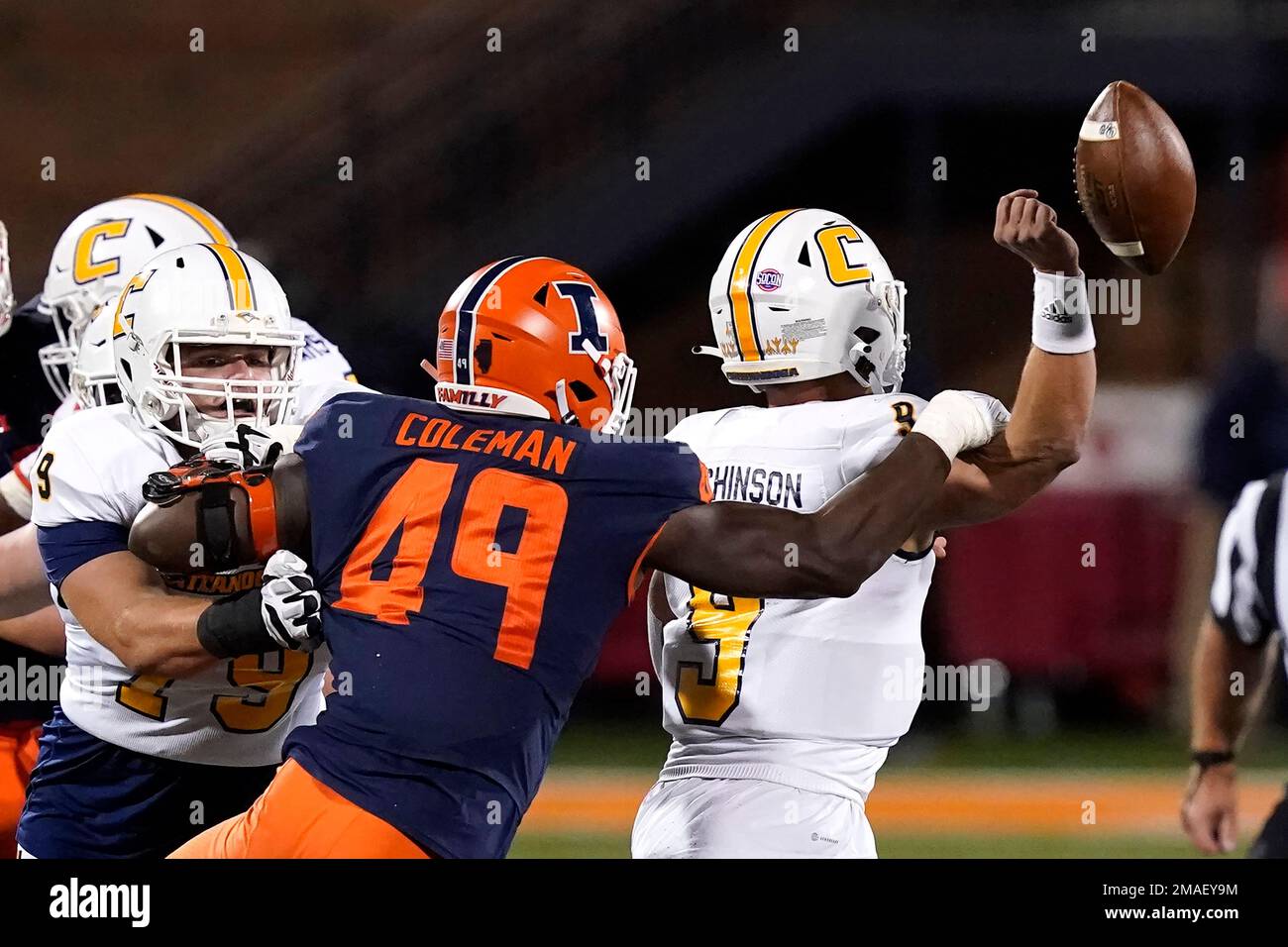 Illinois linebacker Seth Coleman (49) strips Chattanooga quarterback ...