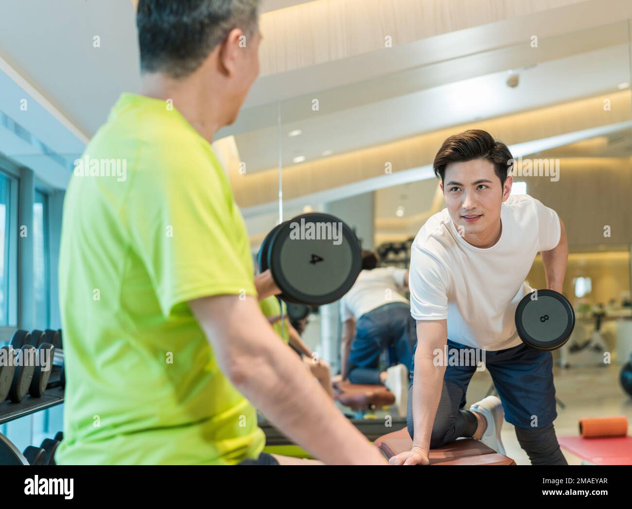 Father and son in the gym Stock Photo - Alamy