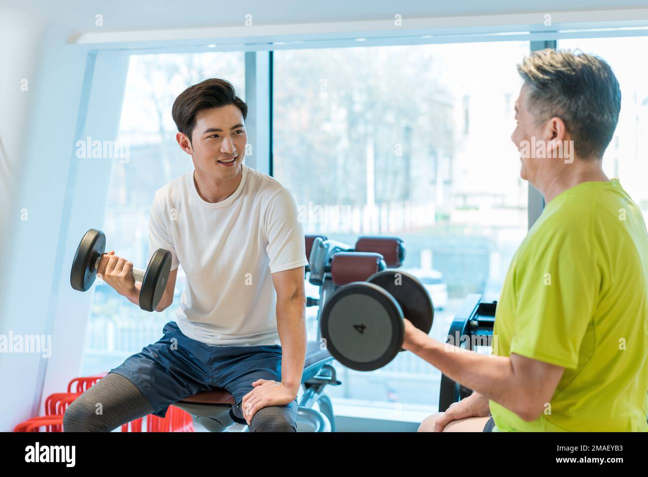 Father and son in the gym Stock Photo - Alamy