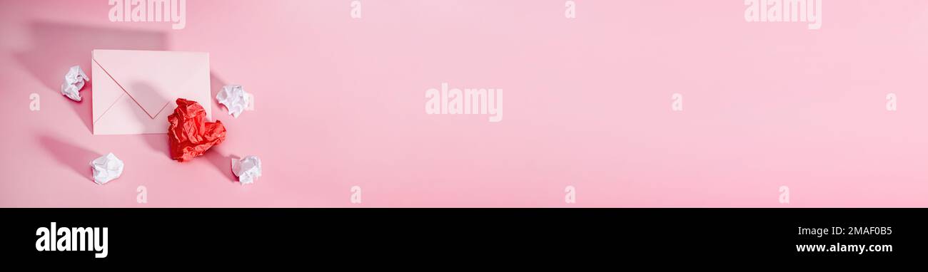 Paper heart and crumpled sheets of paper for writing with a craft ...