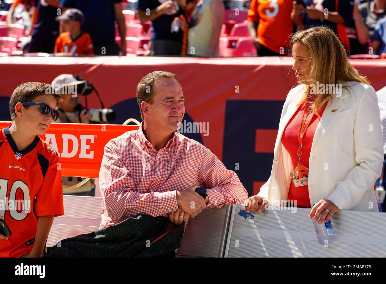 Peyton Manning, left, and Denver Broncos owner Carrie Walton Penner ...