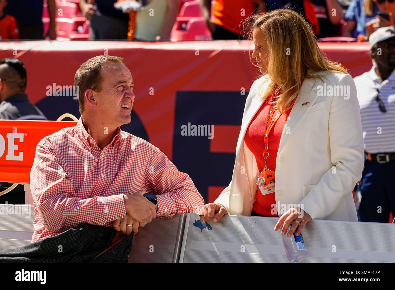 Peyton Manning, left, and Denver Broncos owner Carrie Walton Penner ...