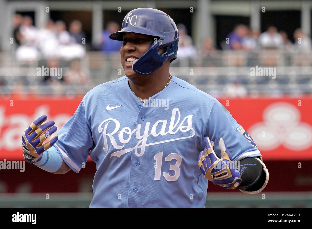 Kansas City Royals' Salvador Perez celebrates on first after hitting an ...