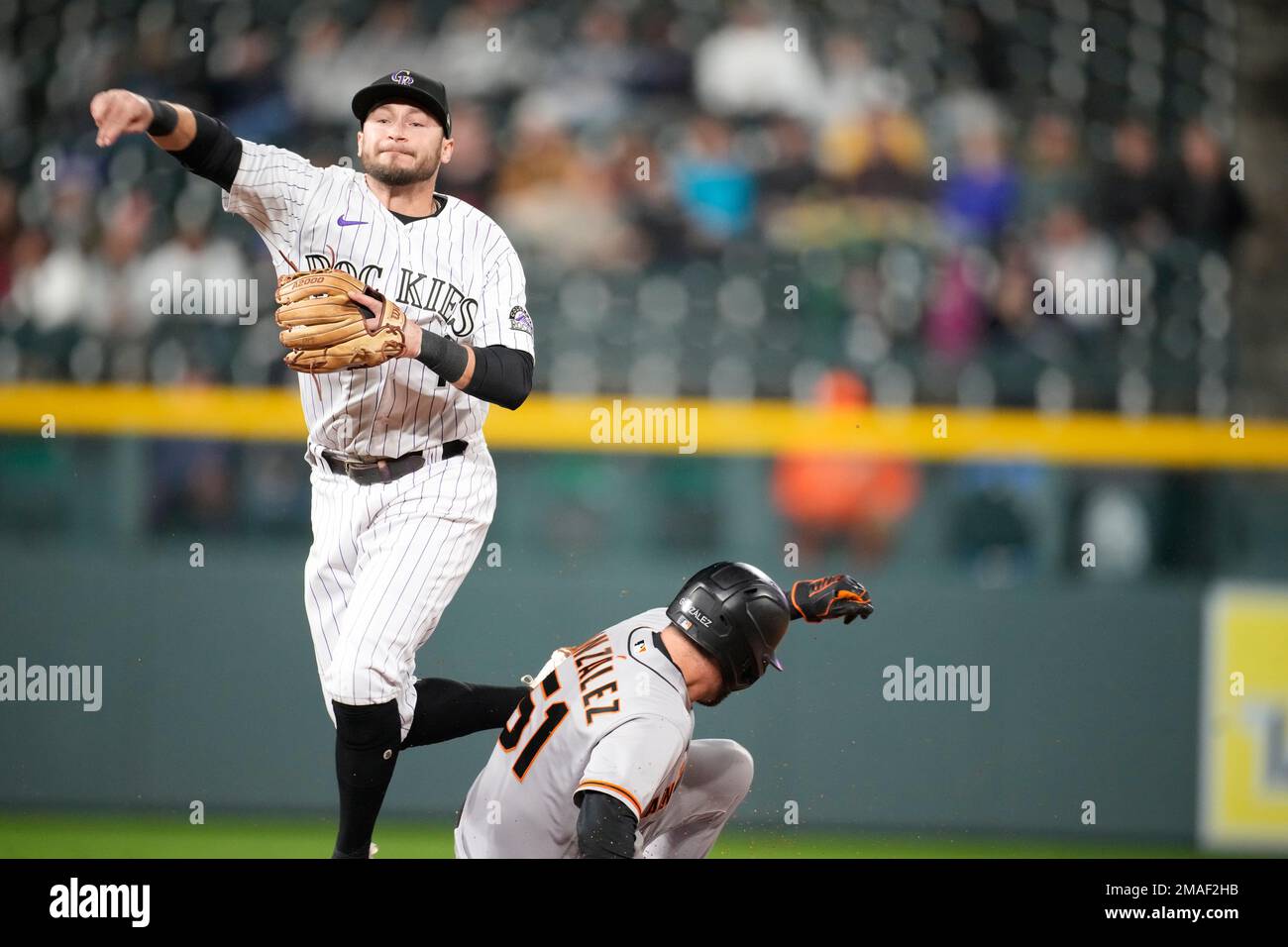 Colorado Rockies shortstop Garrett Hampson (1) throws San Francisco ...