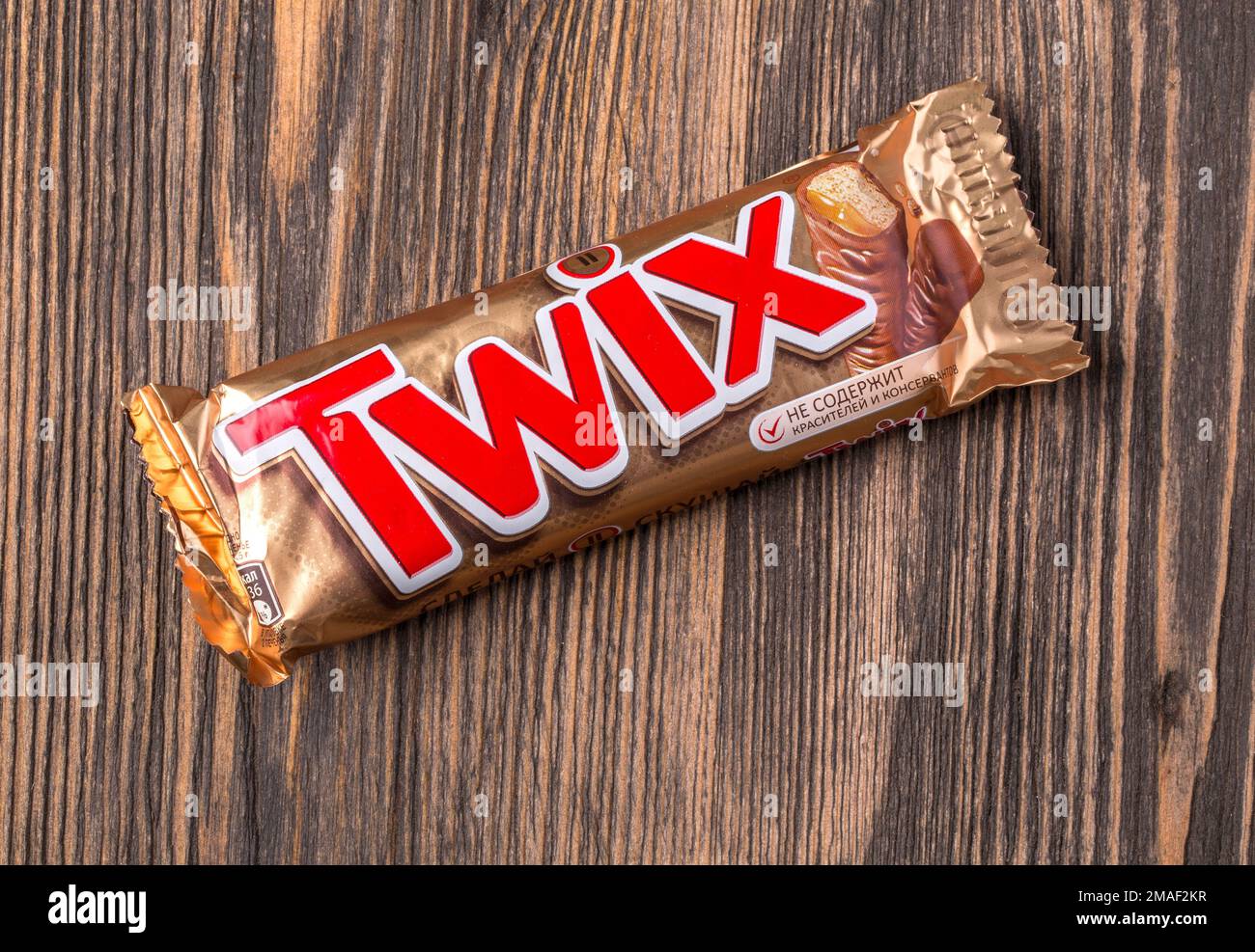 Chisinau, Moldova - August, 28, 2016. Twix wrapper on wooden background ...