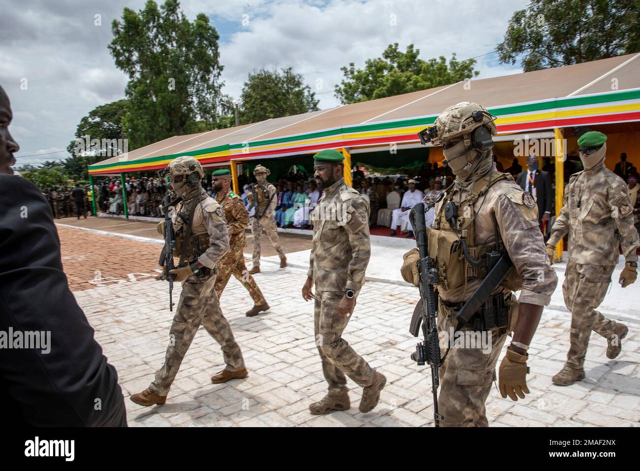 Leader of Mali's ruling junta Lt. Col. Assimi Goita, center, attends an ...