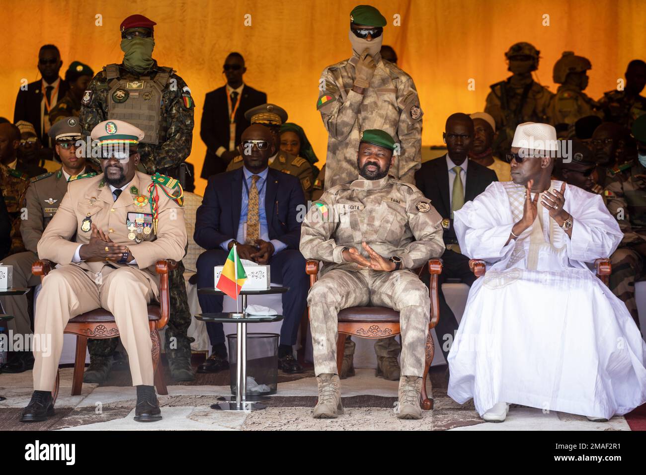 Leader of Mali's ruling junta Lt. Col. Assimi Goita, center, sits with Guinea's junta leader Col ...
