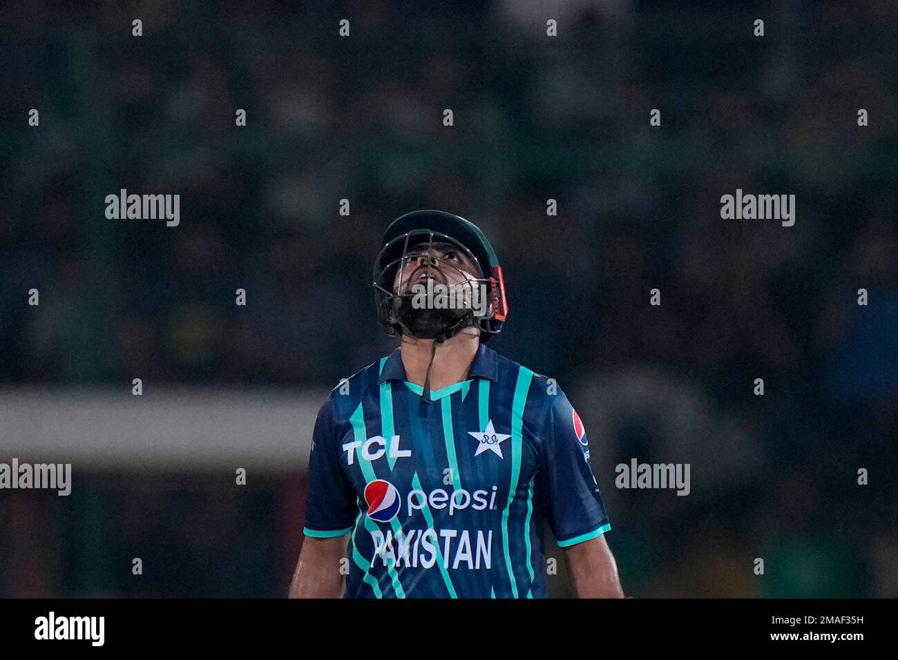 Pakistan's captain Babar Azam looks skywards after scoring fifty runs ...