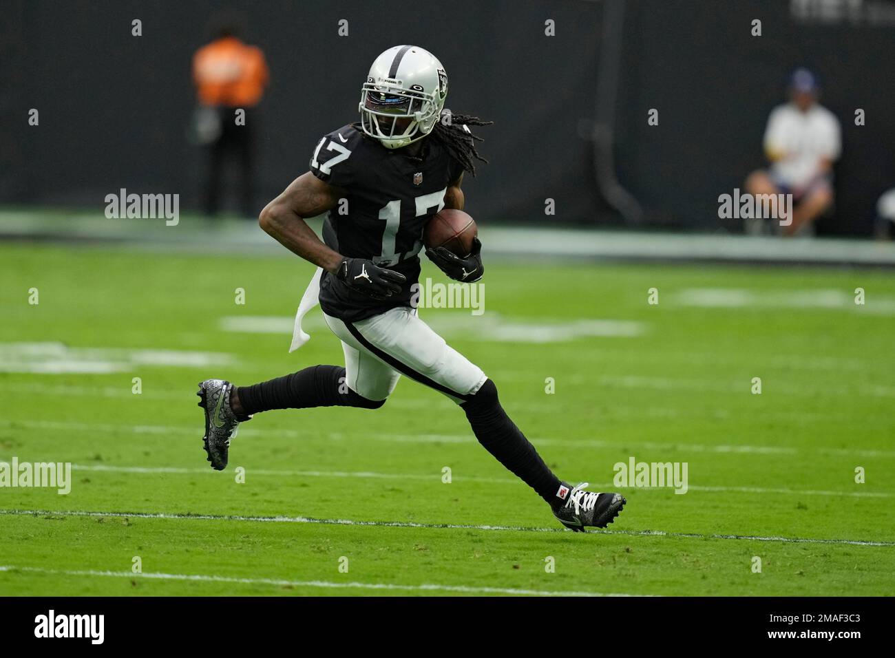 Las Vegas Raiders wide receiver Davante Adams (17) runs against the ...
