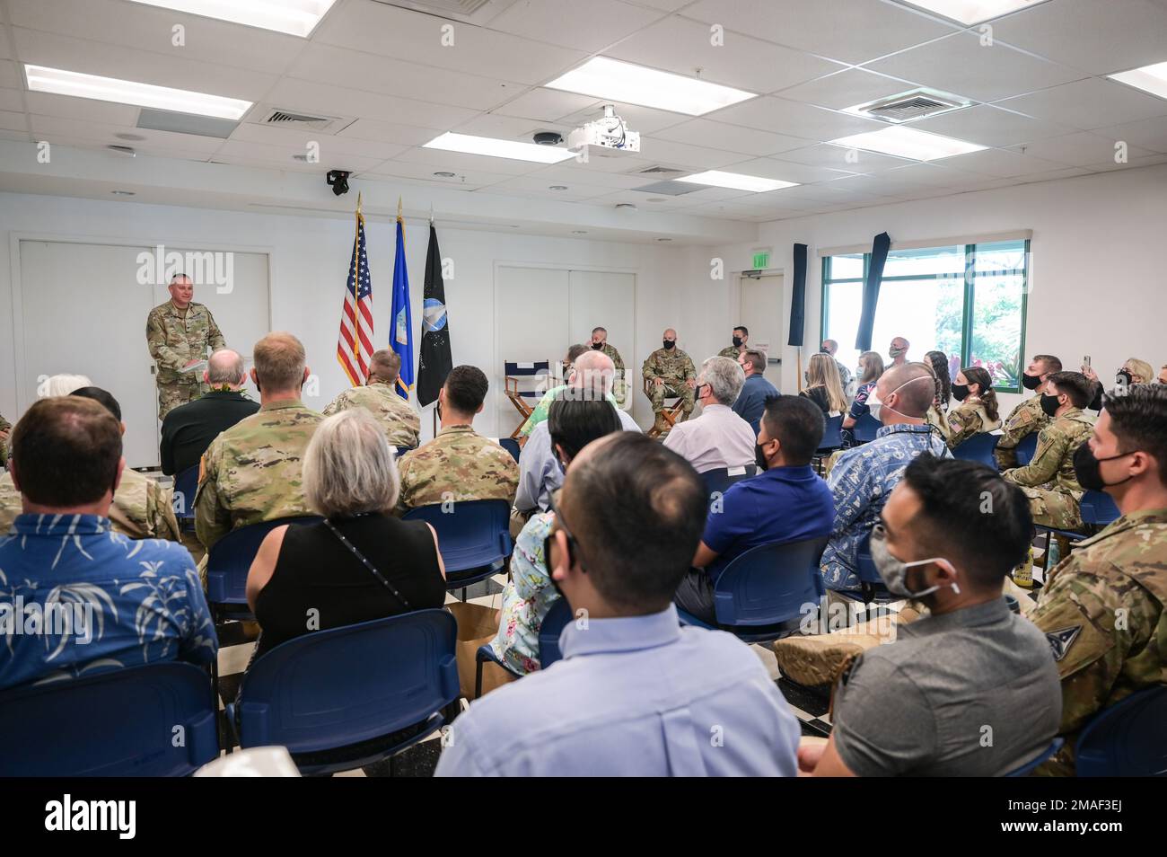 Col. Marc Brock, Space Delta 2 commander, speaks as the presiding ...
