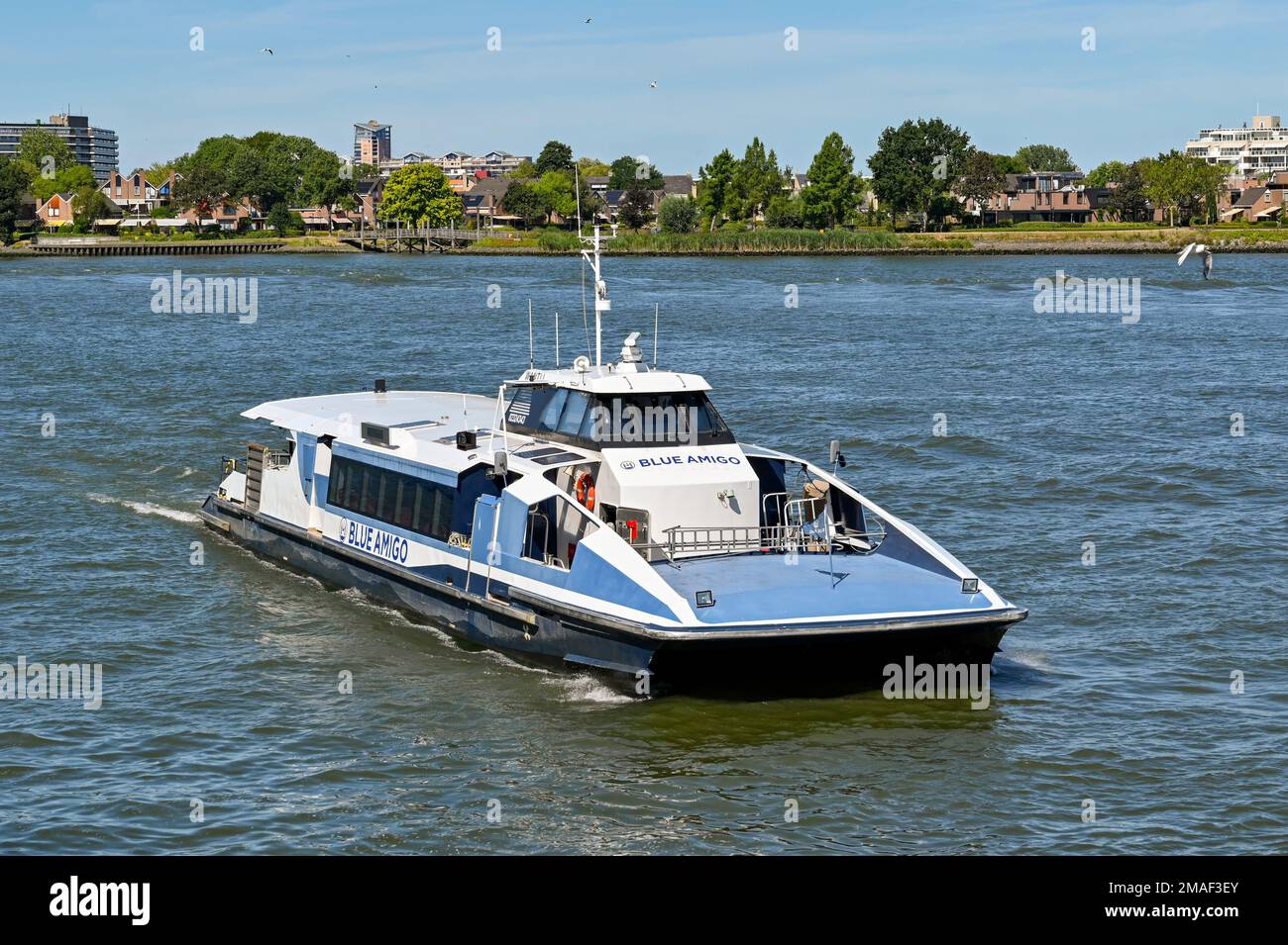 Dordrecht, Netherlands - August 2022: Small fast ferry operated by Blue ...