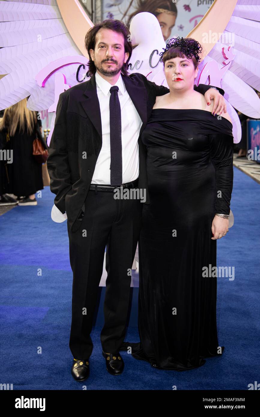 Luis Felber, left, and Lena Dunham pose for photographers upon arrival ...