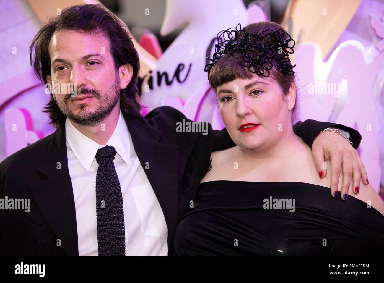 Luis Felber, left, and Lena Dunham pose for photographers upon arrival ...