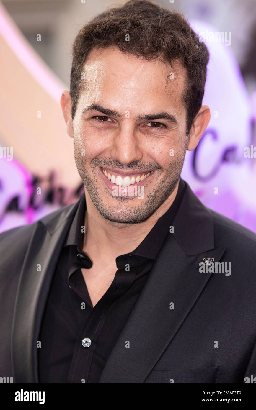 Jeremy Parisi poses for photographers upon arrival for the UK premiere ...