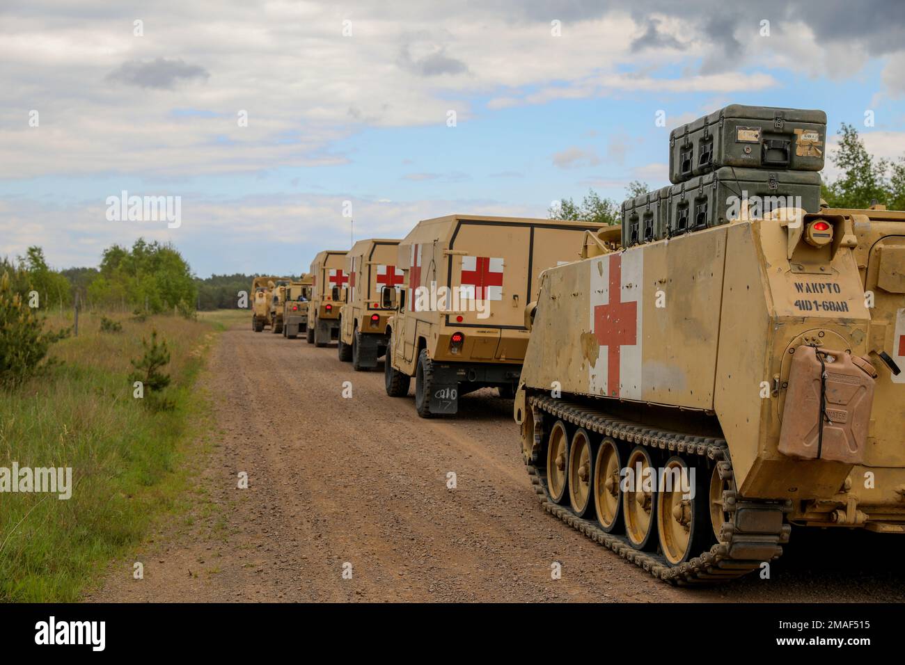 U.S. Army ambulance vehicles assigned to the 64th Brigade Support ...