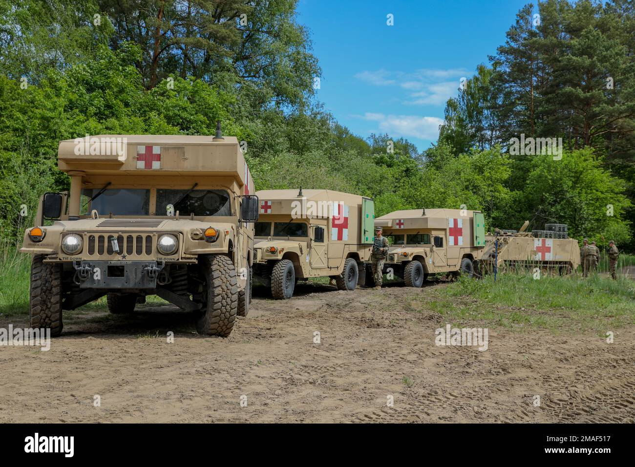U.S. Army ambulance vehicles assigned to the 64th Brigade Support ...