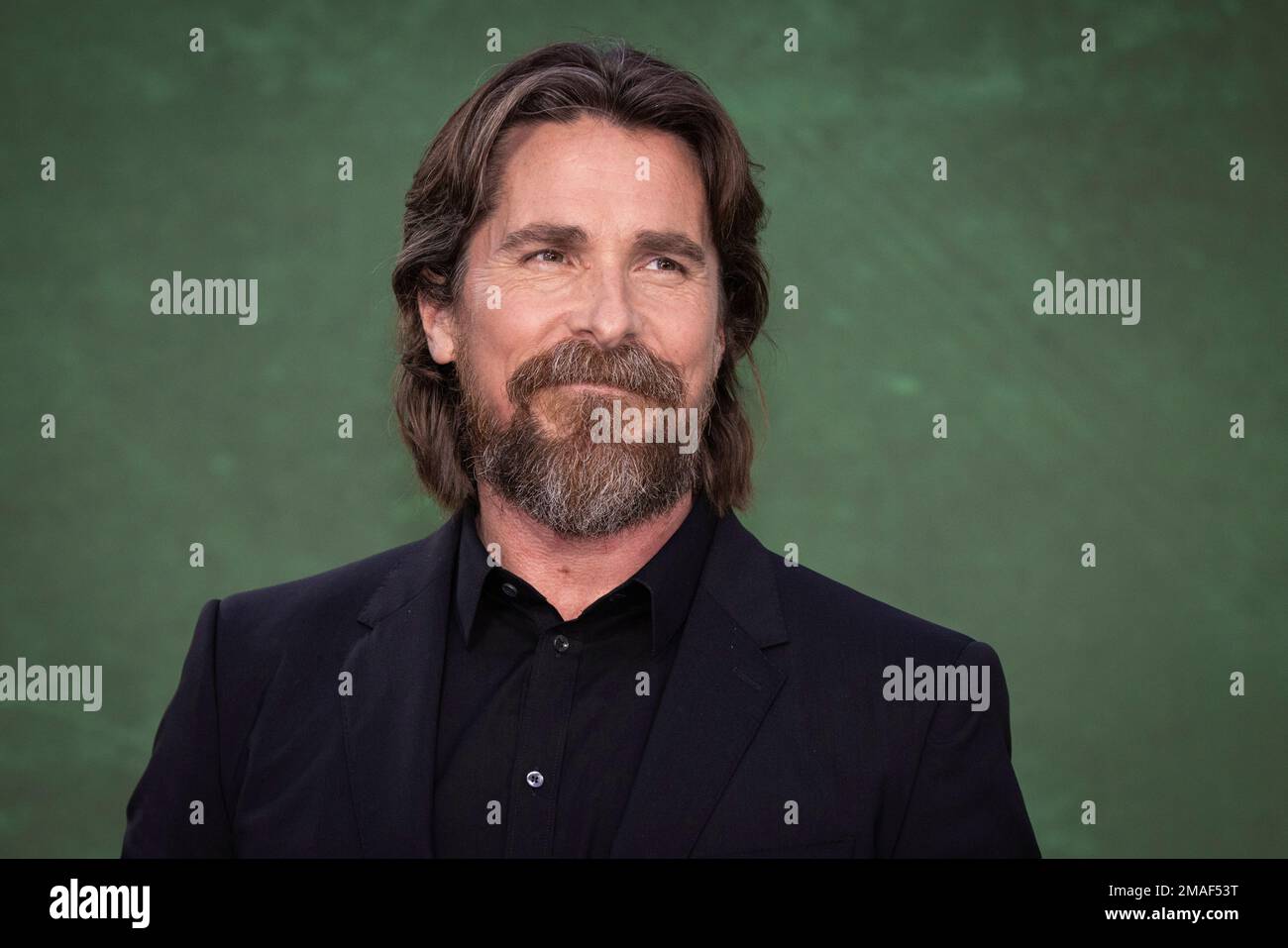 Christian Bale poses for photographers upon arrival for the premiere of ...