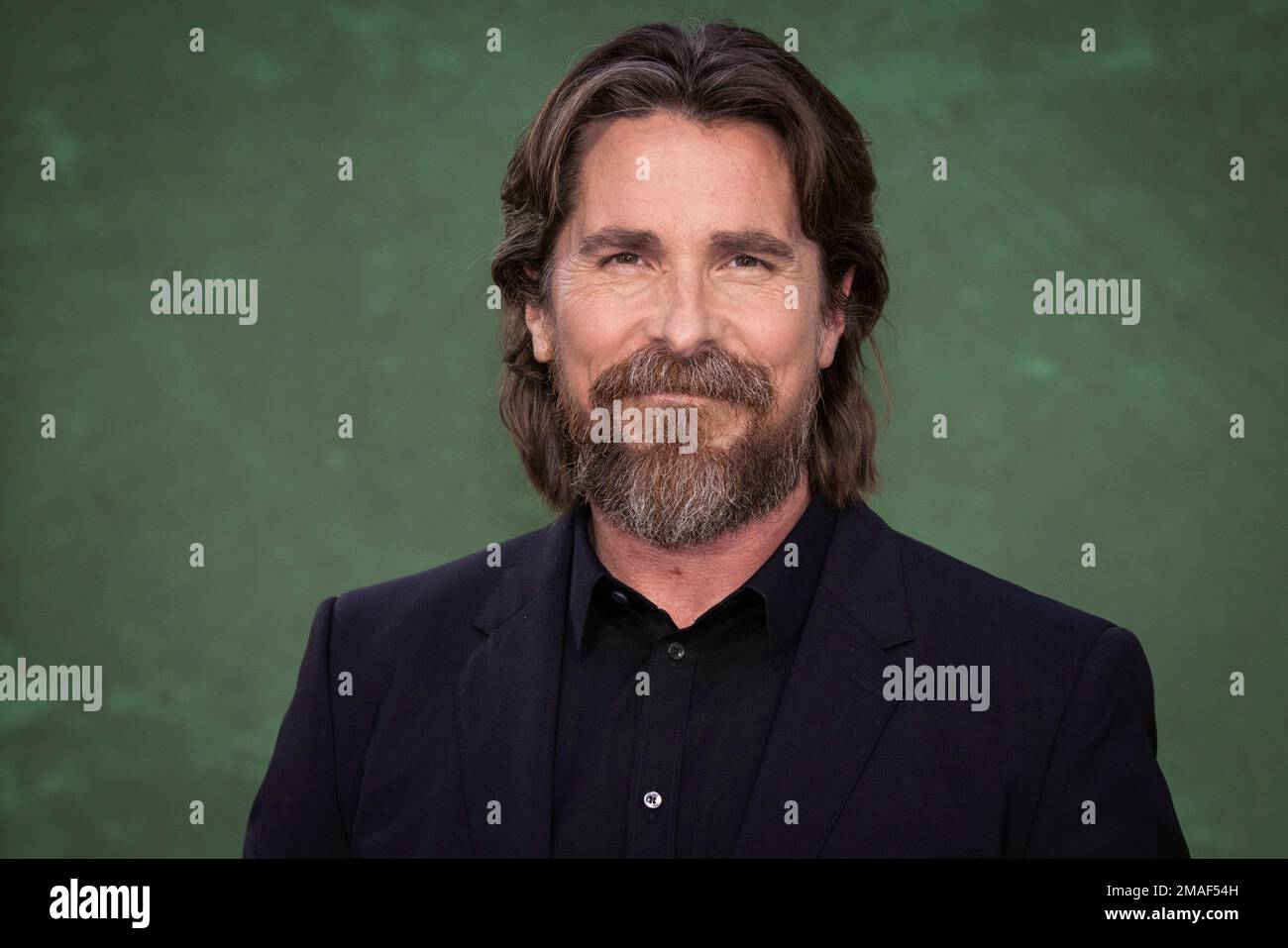 Christian Bale poses for photographers upon arrival for the premiere of ...